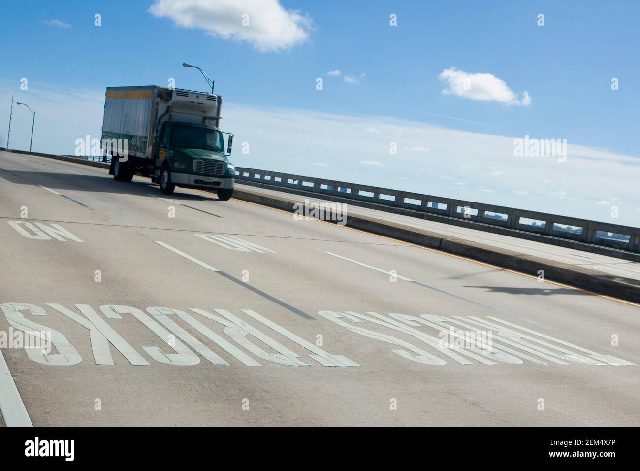 Truck moving on a bridge Stock Photo - Alamy