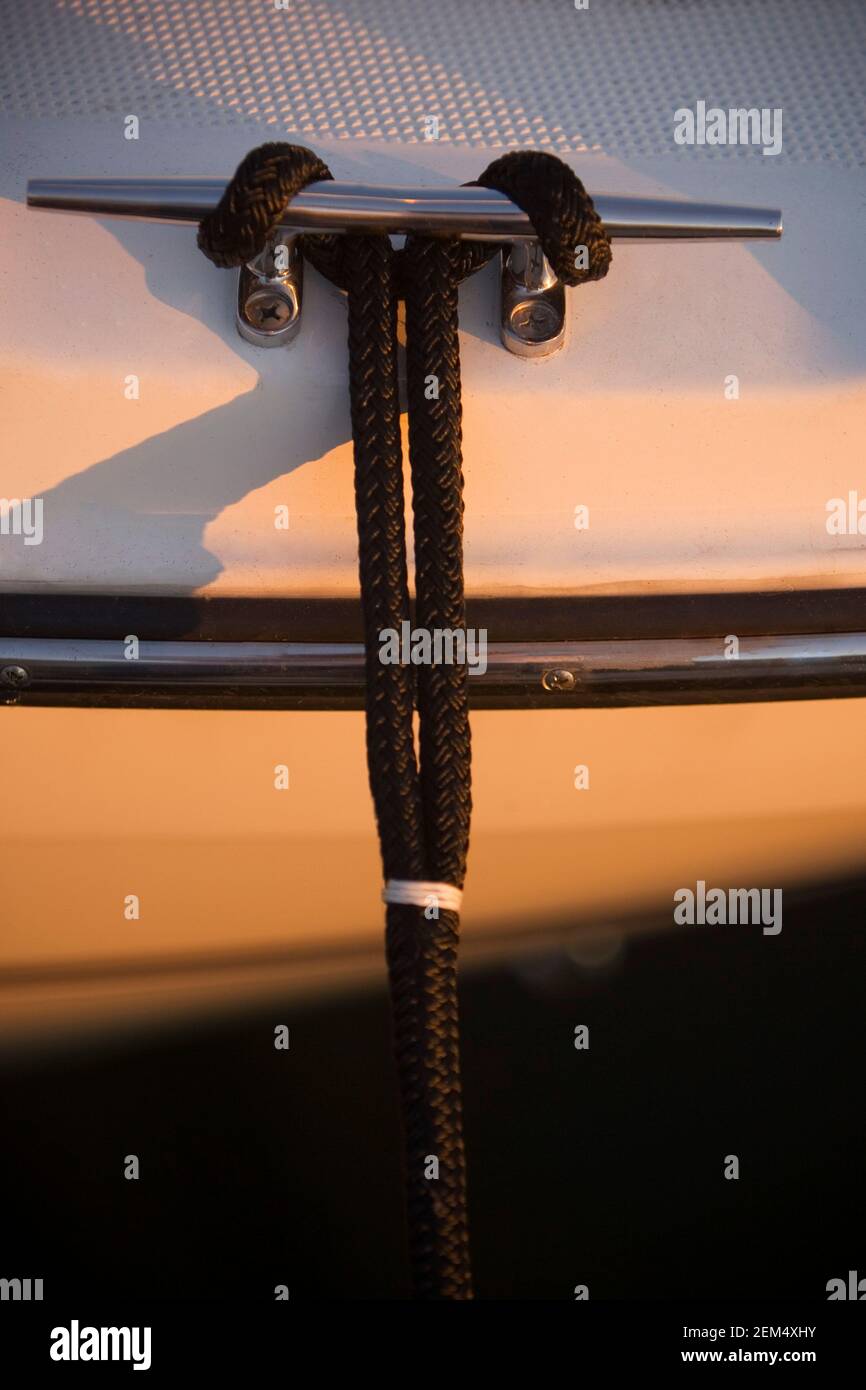 Rope tied to a rod Stock Photo - Alamy