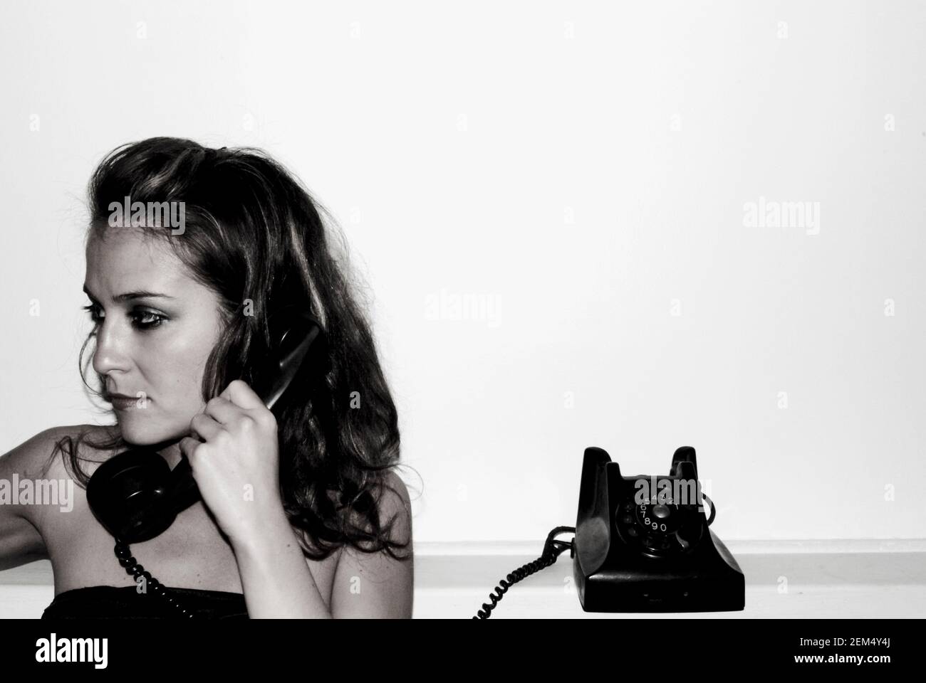Old fashioned telephone receiver woman hi-res stock photography and ...