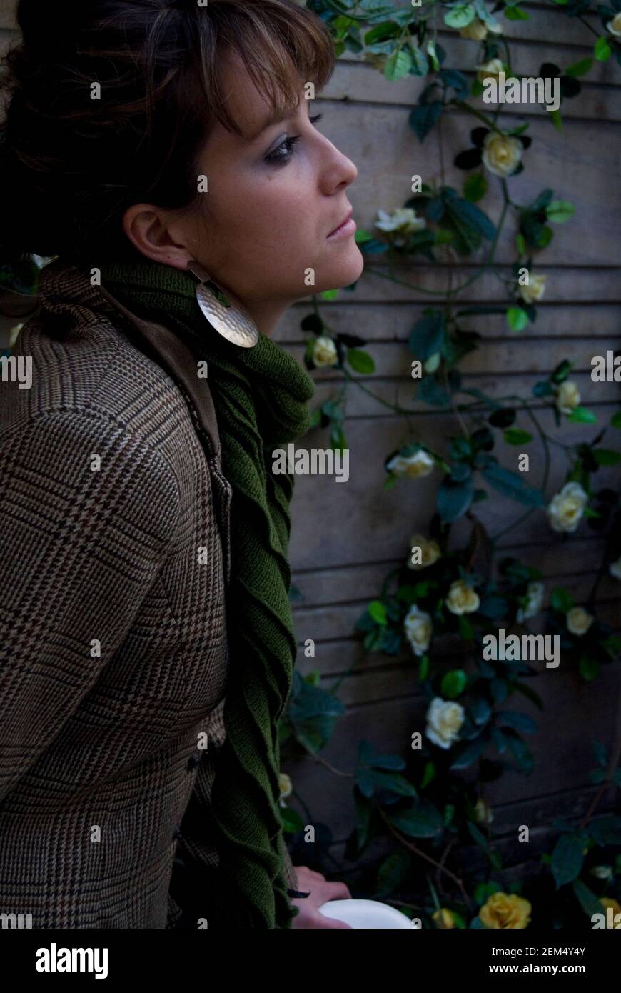 Side profile of a young woman thinking Stock Photo - Alamy