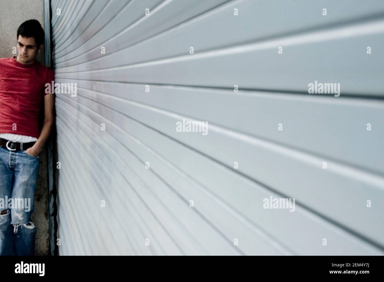 Man leaning against building hands hi-res stock photography and images ...