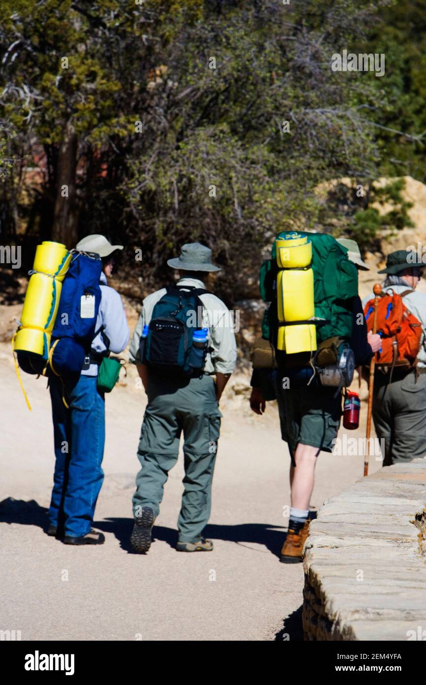 Carrying backpacks hi-res stock photography and images - Alamy