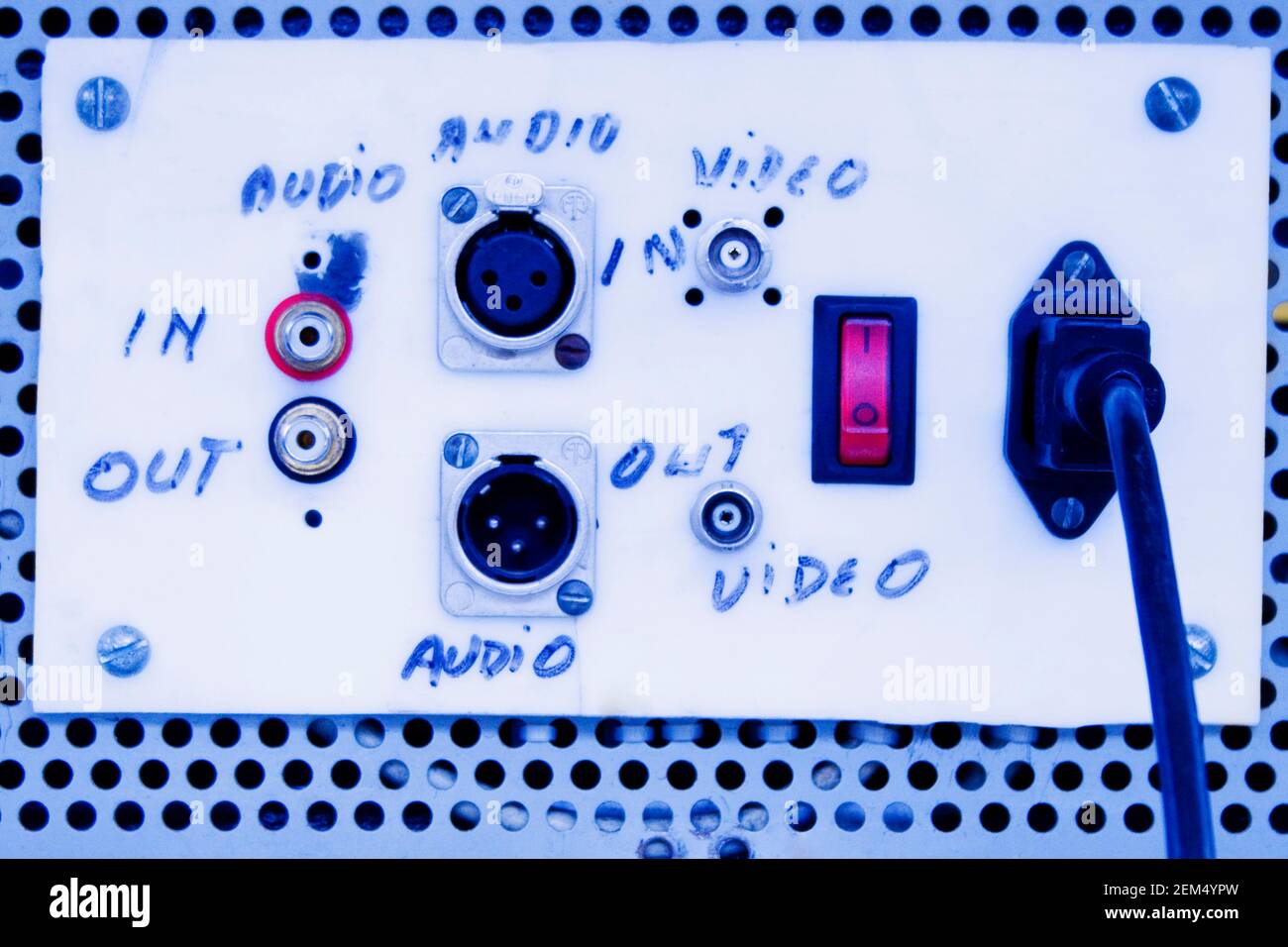 Electric plug and outlets and a switch on metal plate Stock Photo - Alamy