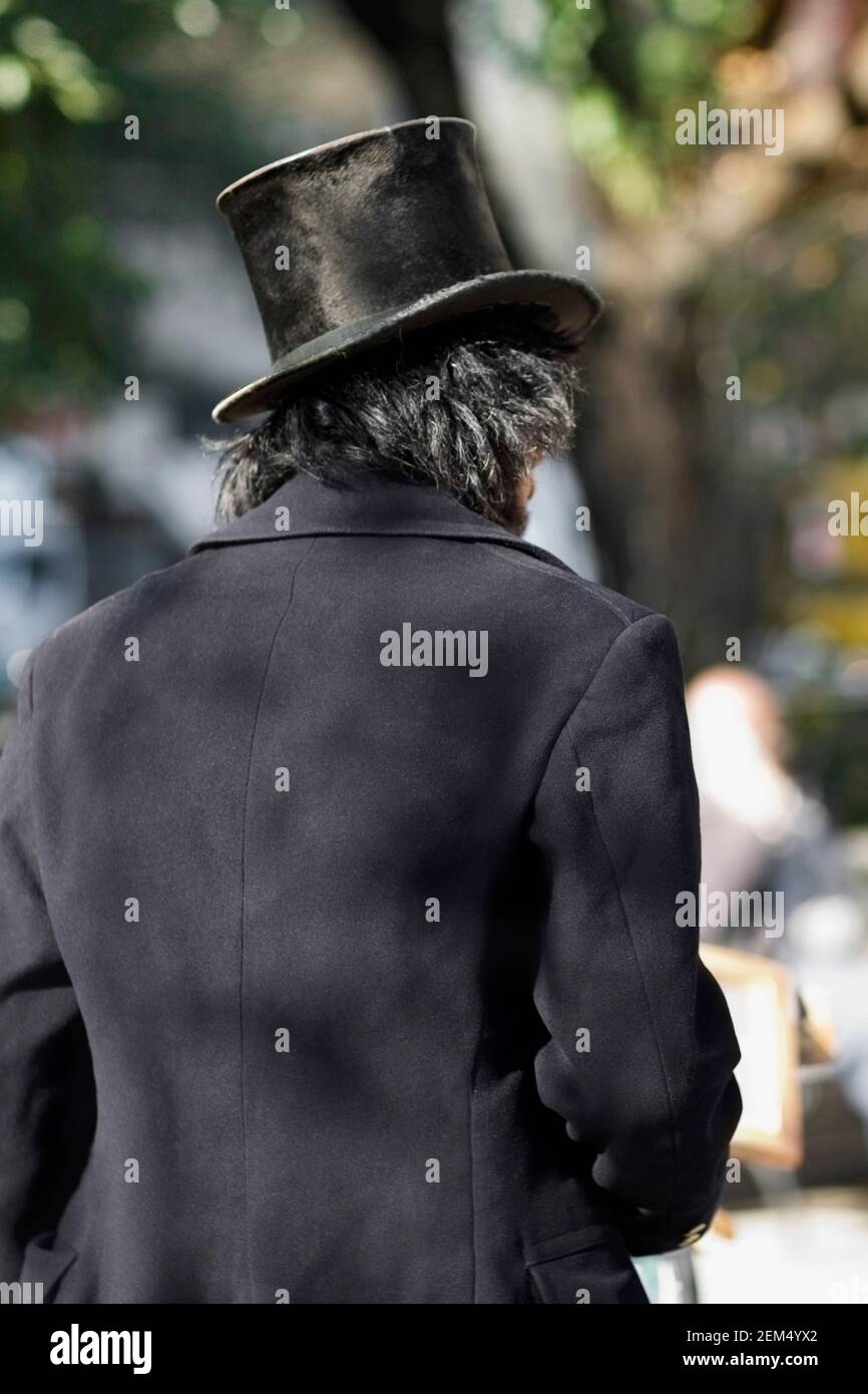 Rear view of a man standing Stock Photo - Alamy