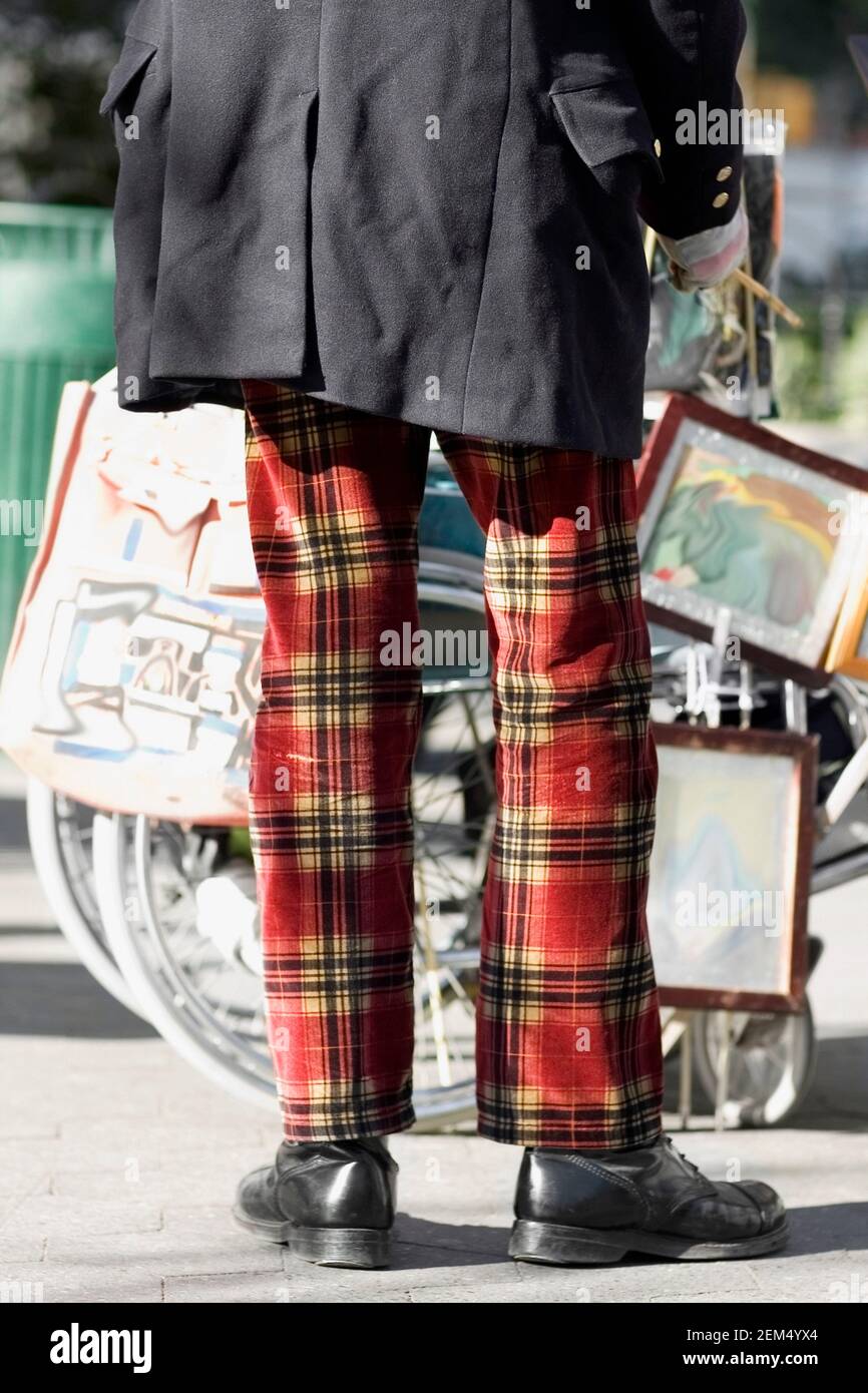 Low section view of a man standing at a market stall Stock Photo - Alamy