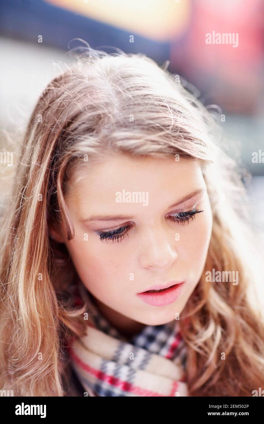 Close-up of a teenage girl looking serious Stock Photo - Alamy