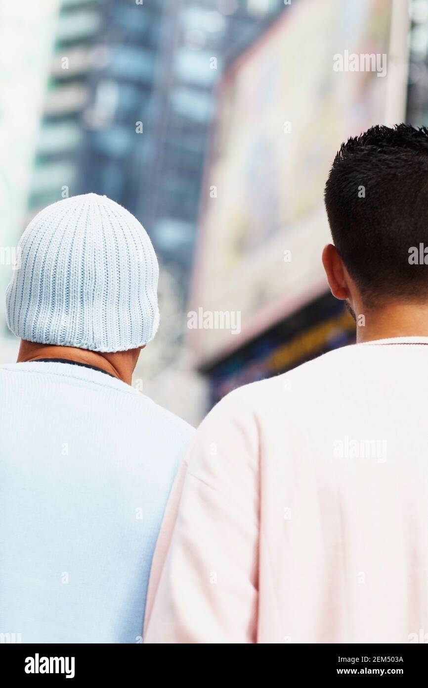 Rear view of two men Stock Photo - Alamy