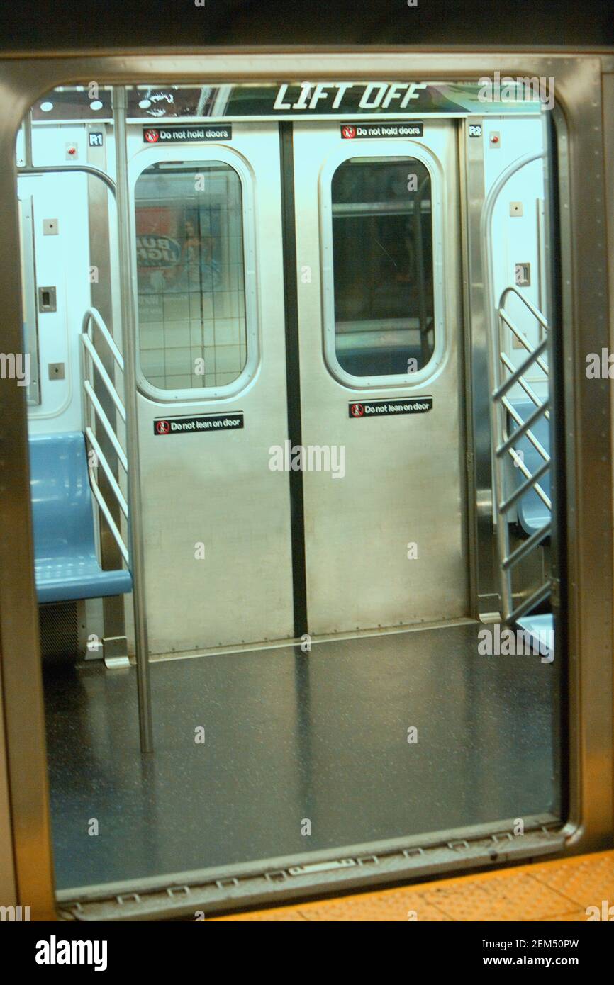 Closed doors of a subway train Stock Photo - Alamy