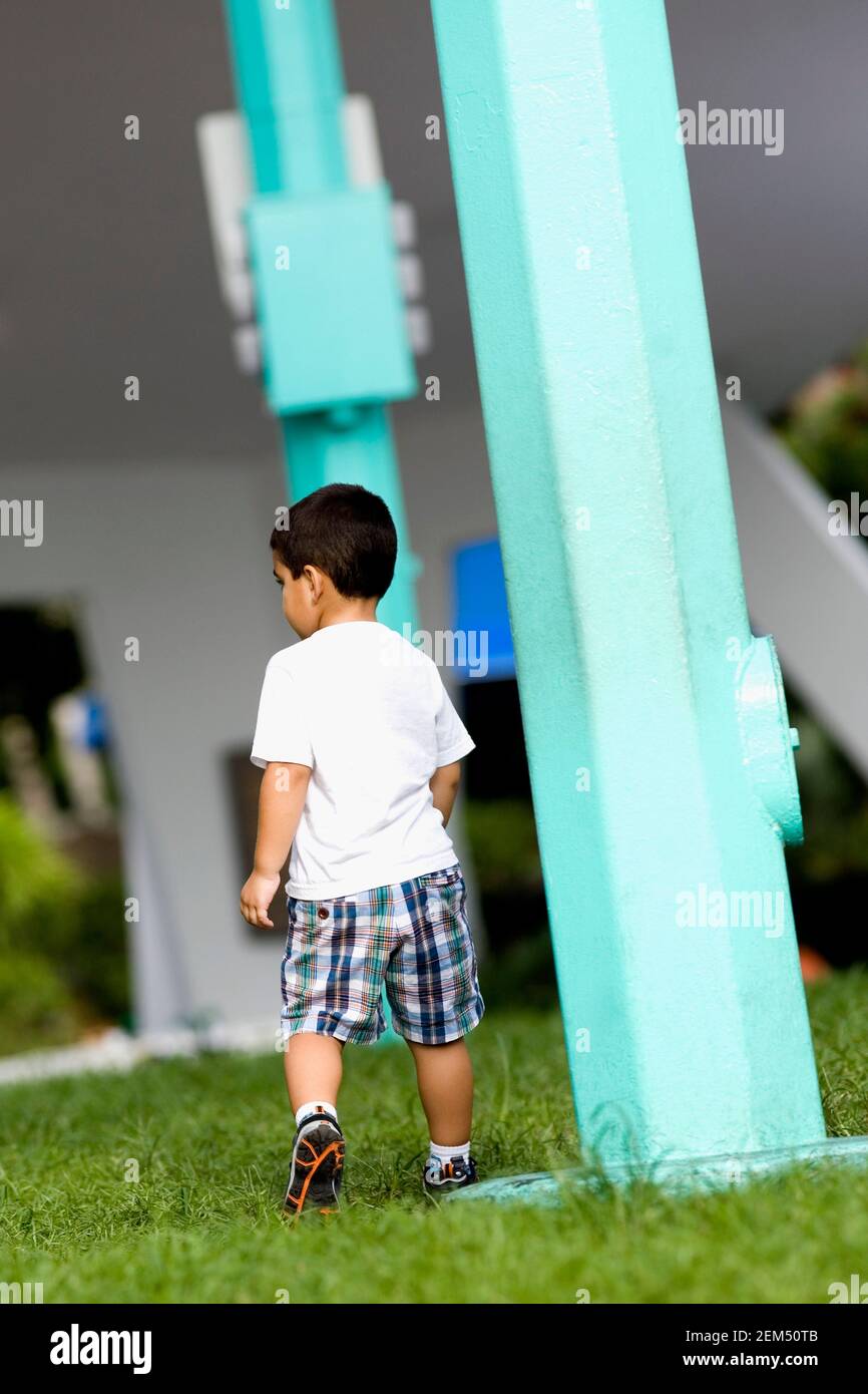 Rear view of a boy standing Stock Photo - Alamy