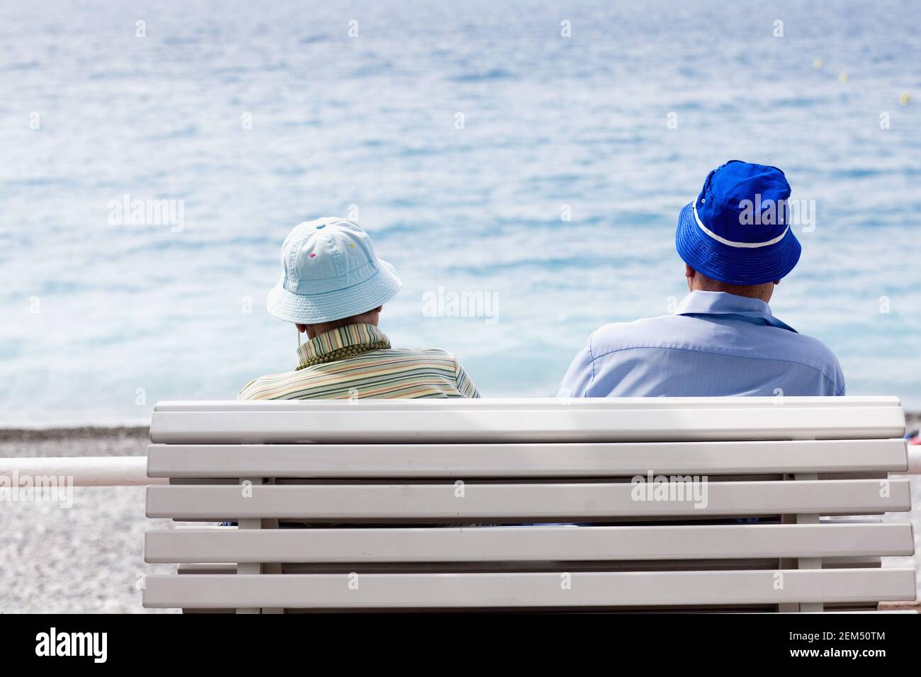 Two men sitting on a bench hi-res stock photography and images - Alamy