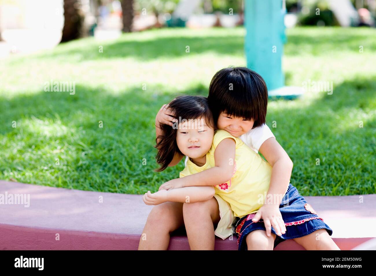 Two girls smiling Stock Photo - Alamy
