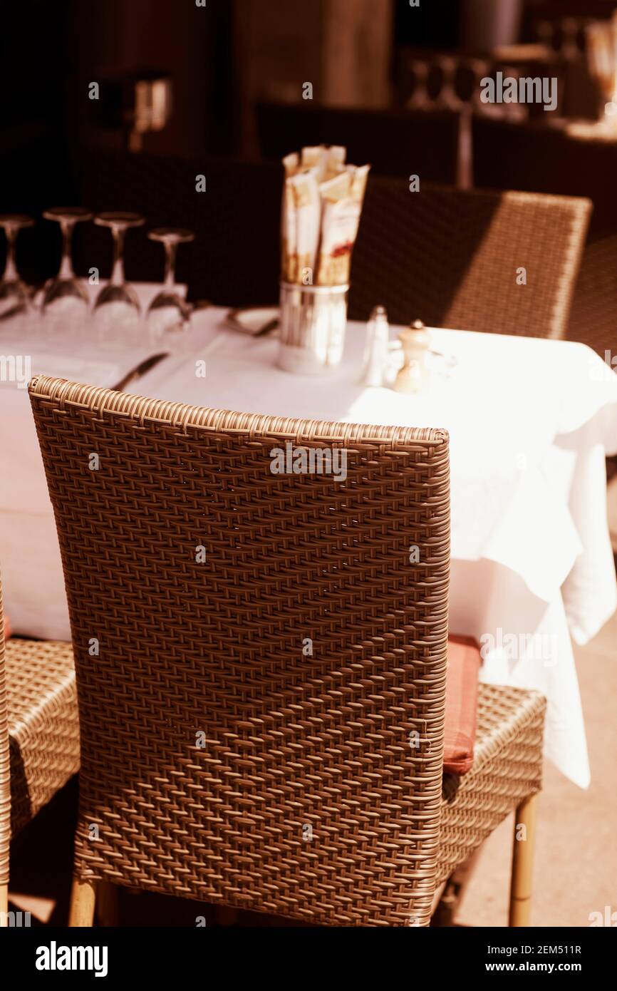 Tables and chairs in a restaurant Stock Photo - Alamy