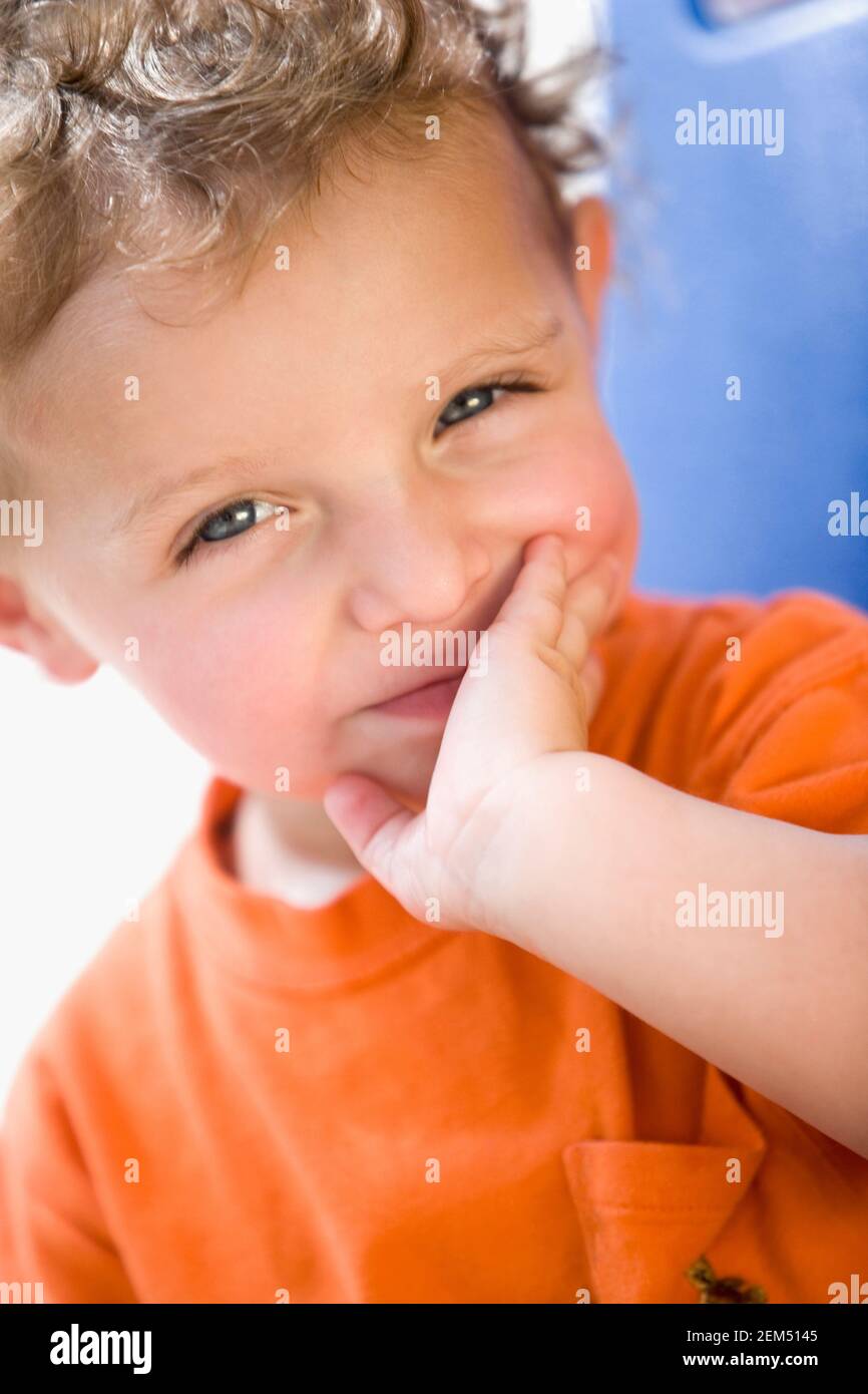 Child hand over mouth hi-res stock photography and images - Alamy