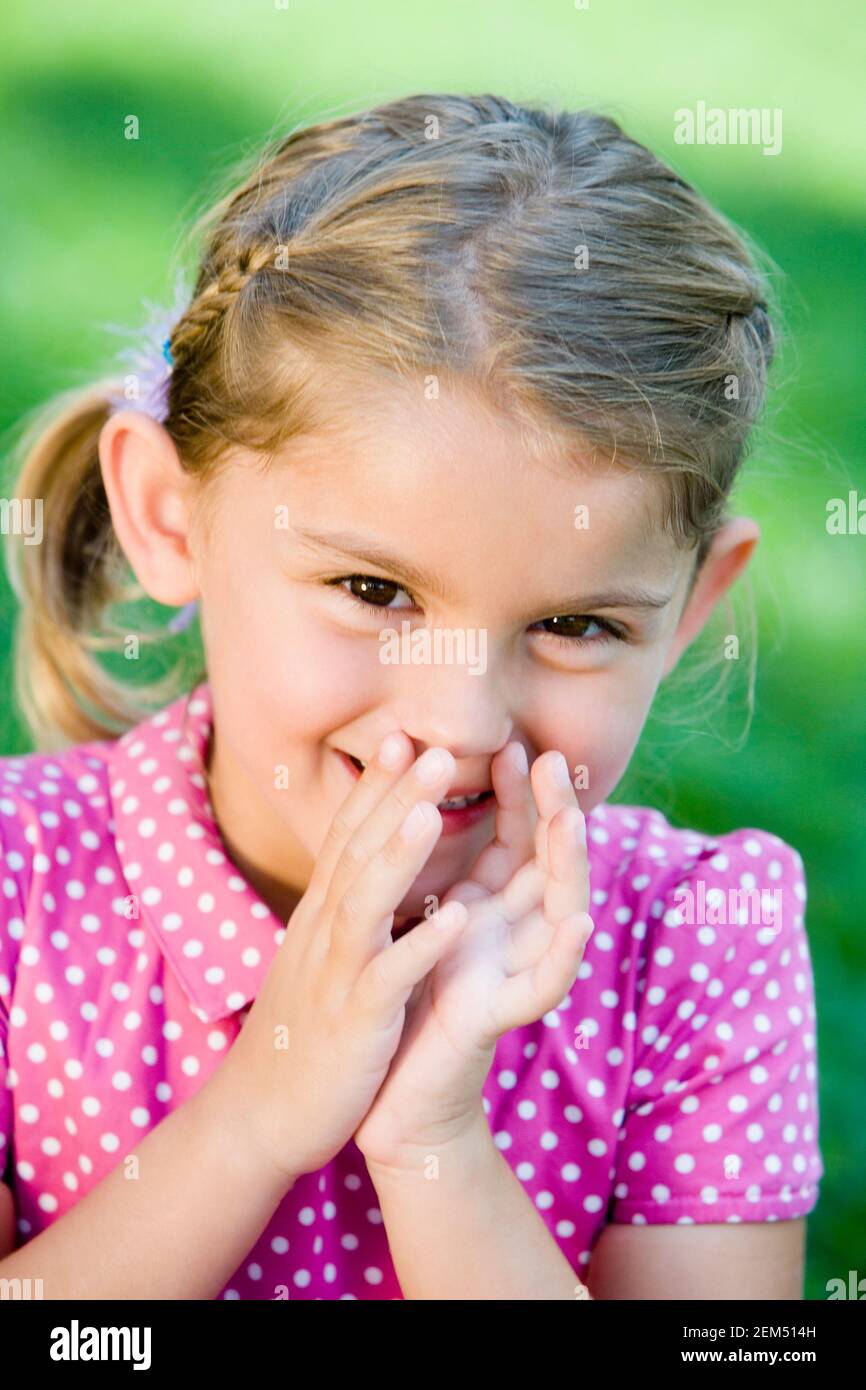 Portrait of a girl clapping Stock Photo - Alamy