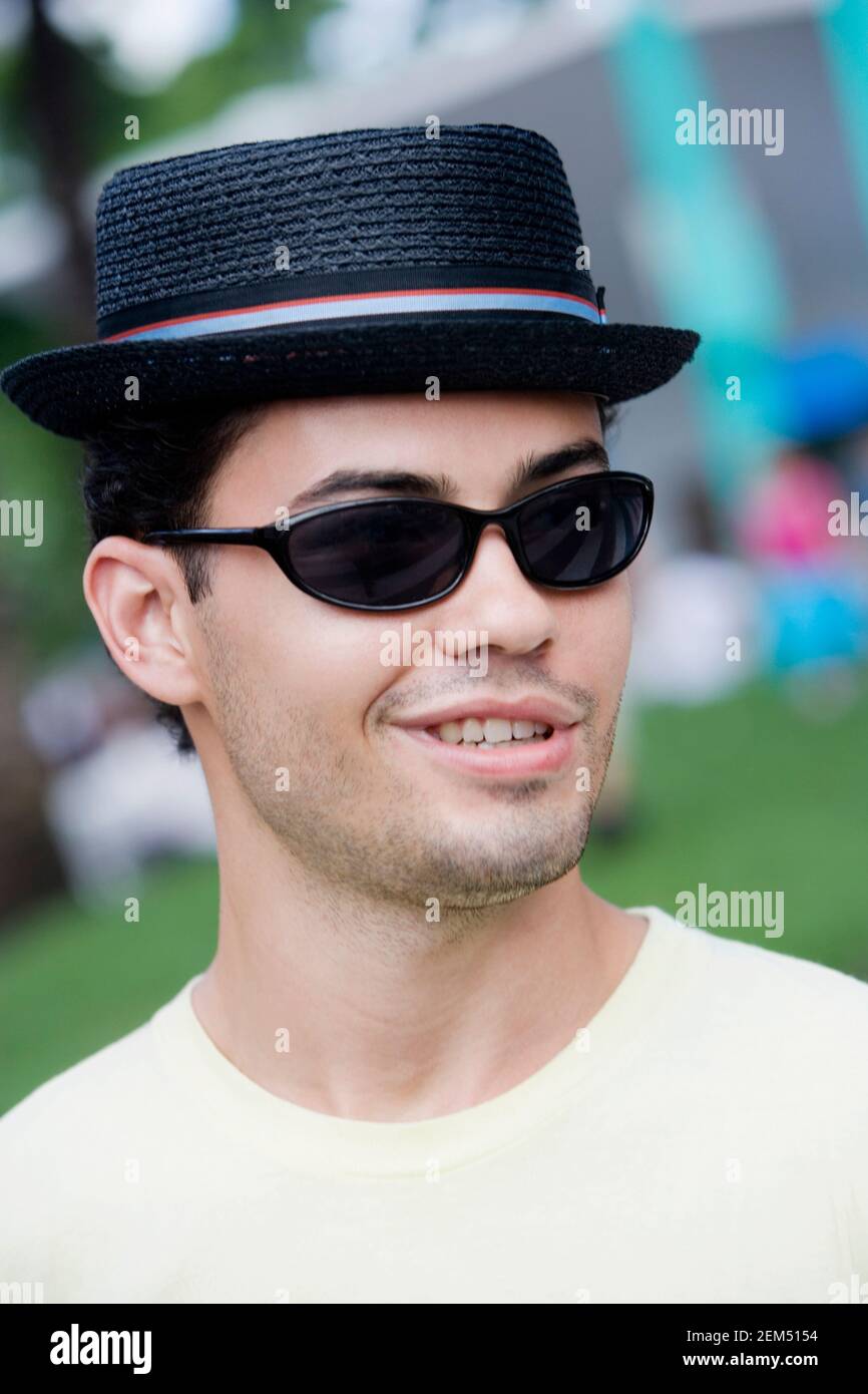 Close-up of a young man smiling Stock Photo - Alamy