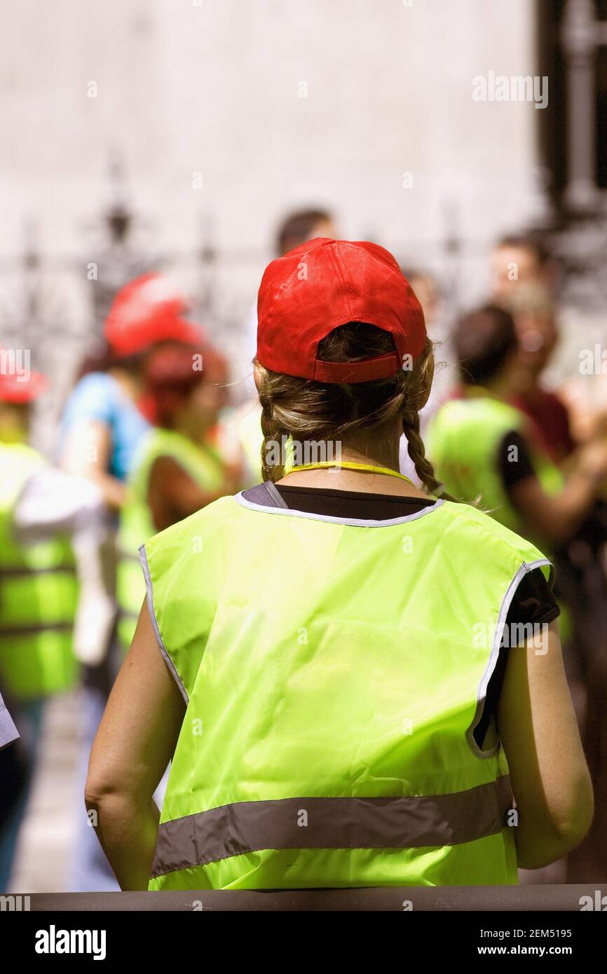 Rear view of a female street sweeper, Madrid, Spain Stock Photo - Alamy