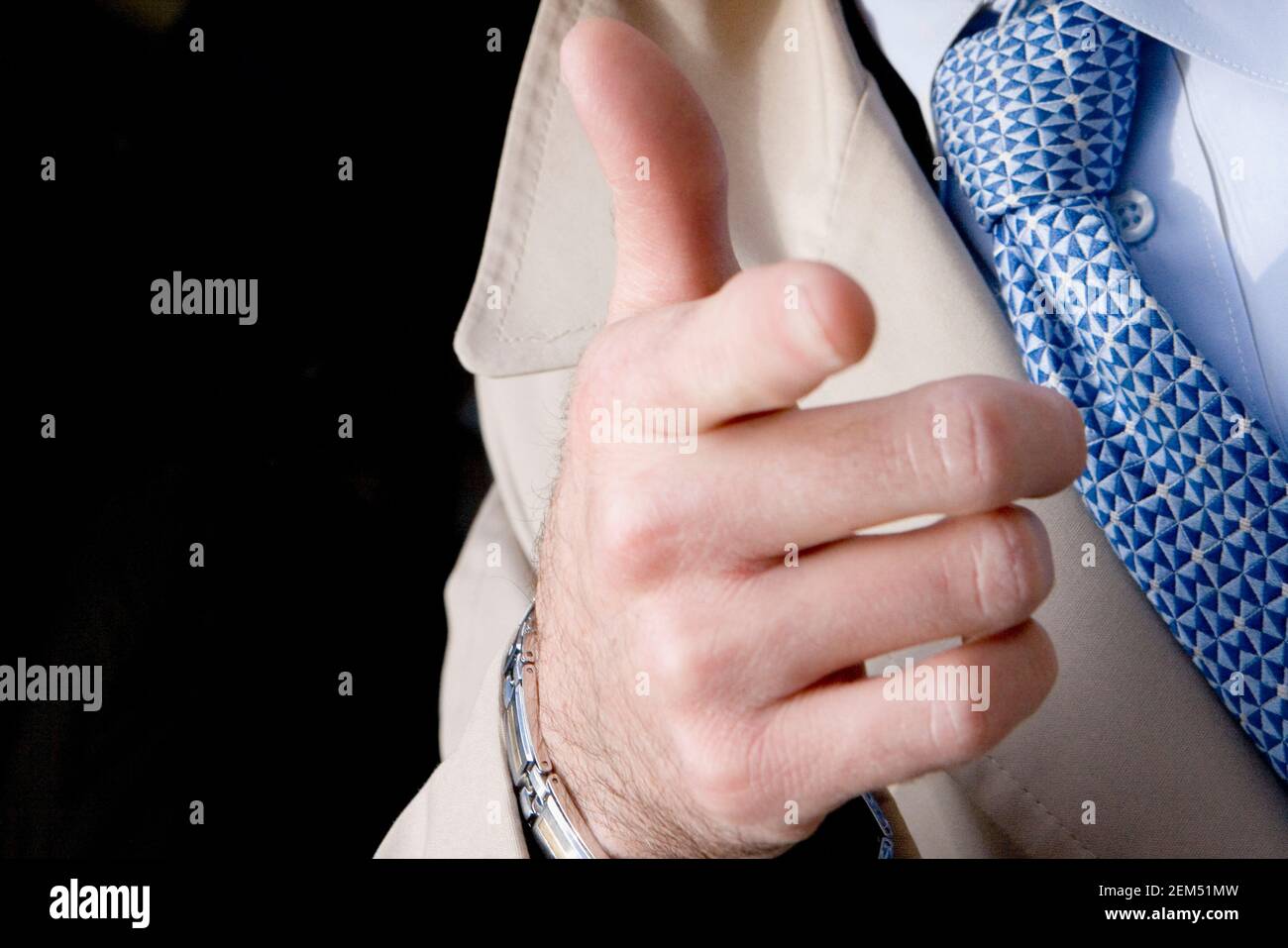 Mid section view of a person pointing forward Stock Photo - Alamy