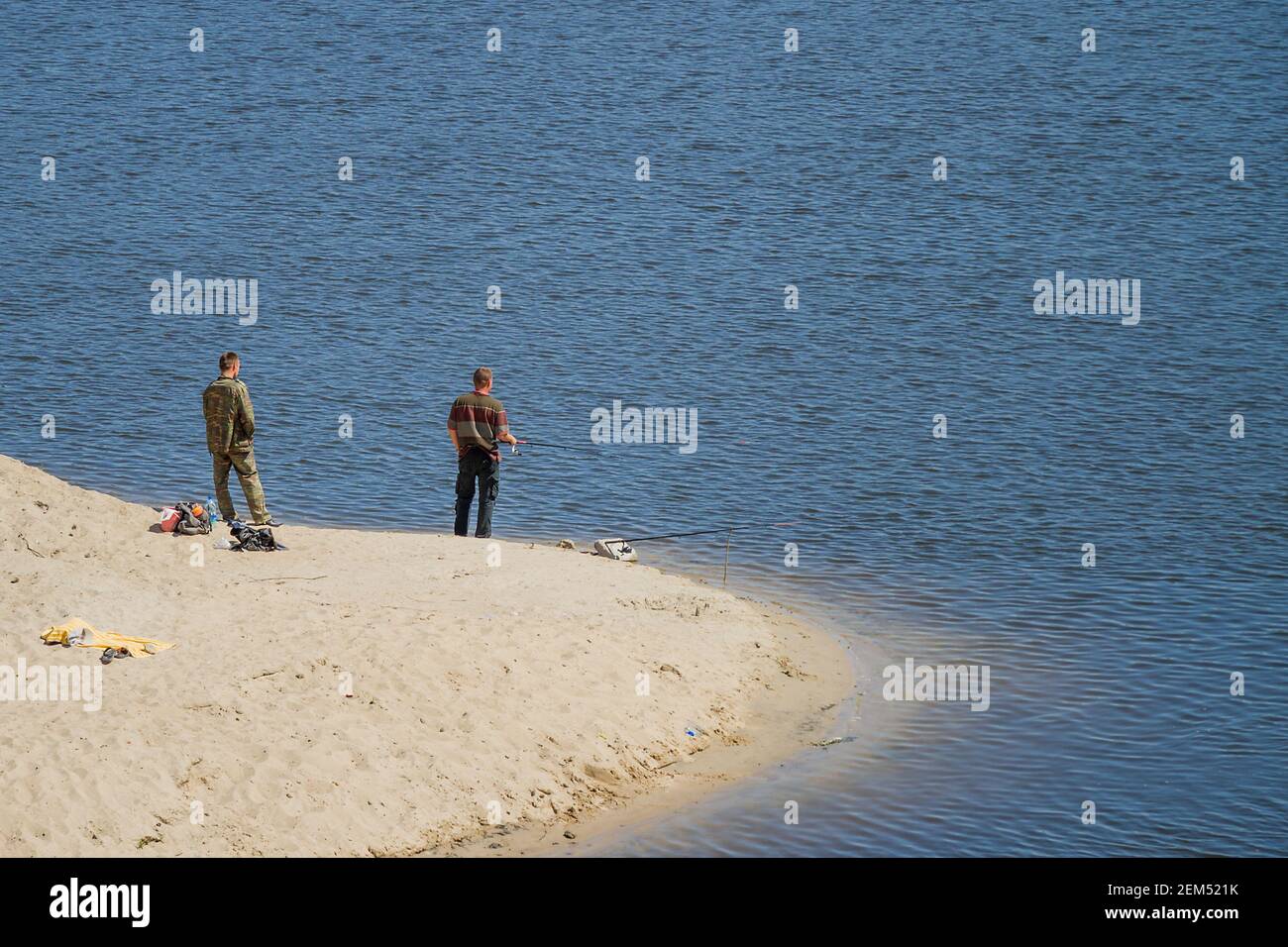 Russia. Moscow region. Fishermen on a sand spit Stock Photo - Alamy