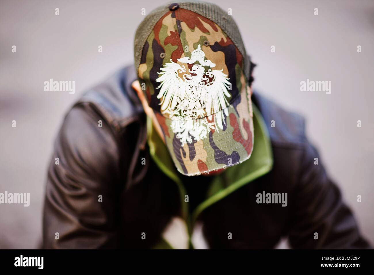 Young man with a cap hi-res stock photography and images - Alamy