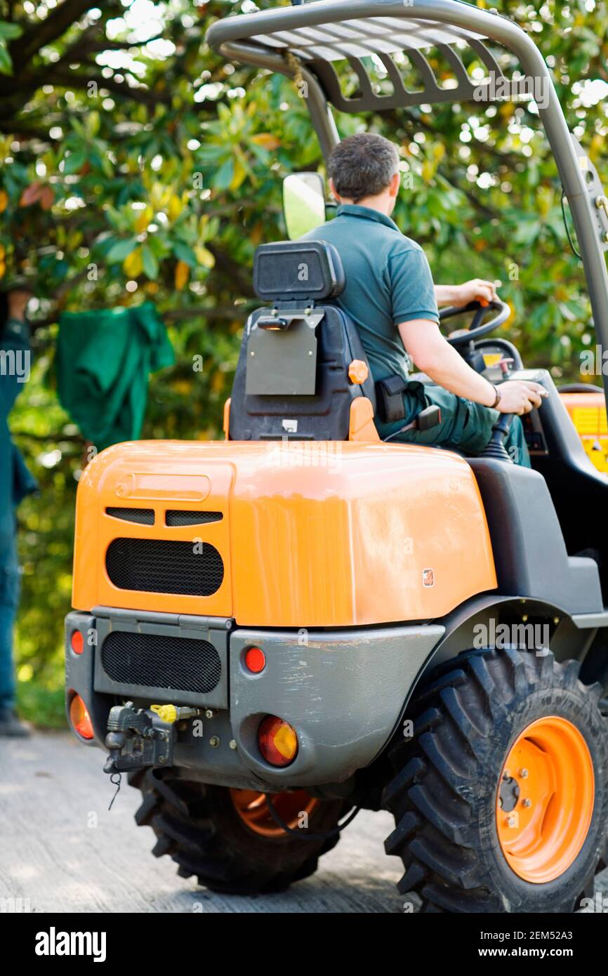 Man driving a tractor hi-res stock photography and images - Alamy