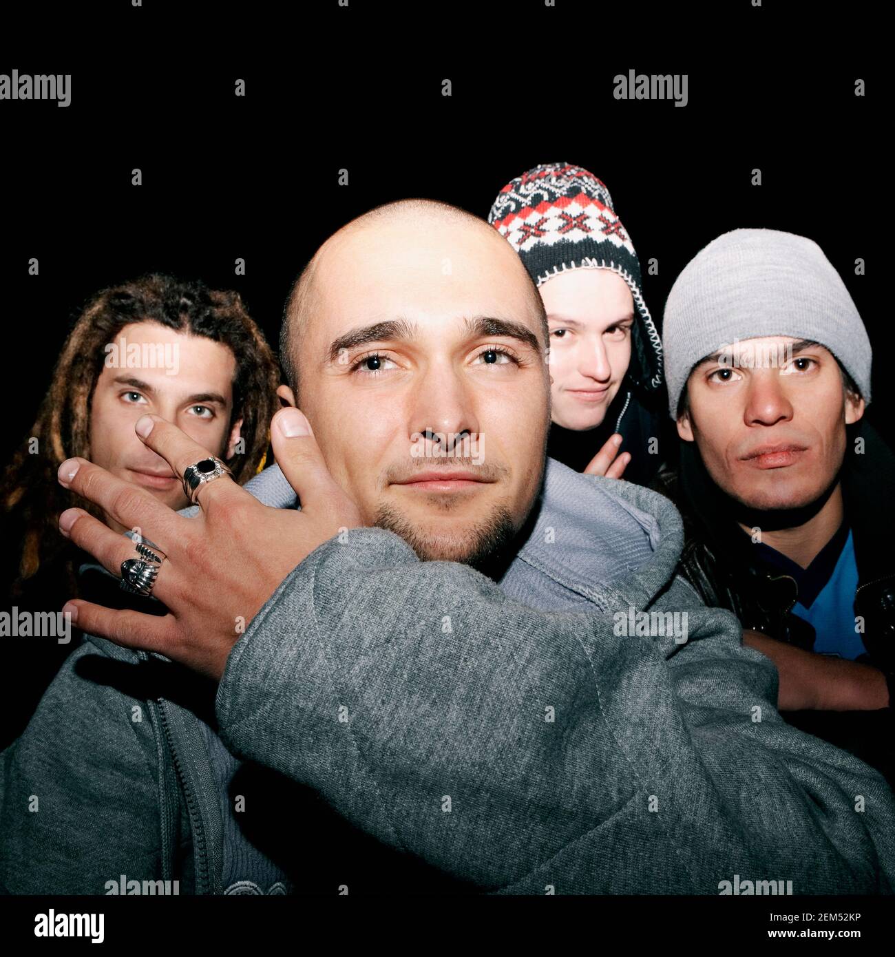 Four young men hi-res stock photography and images - Alamy