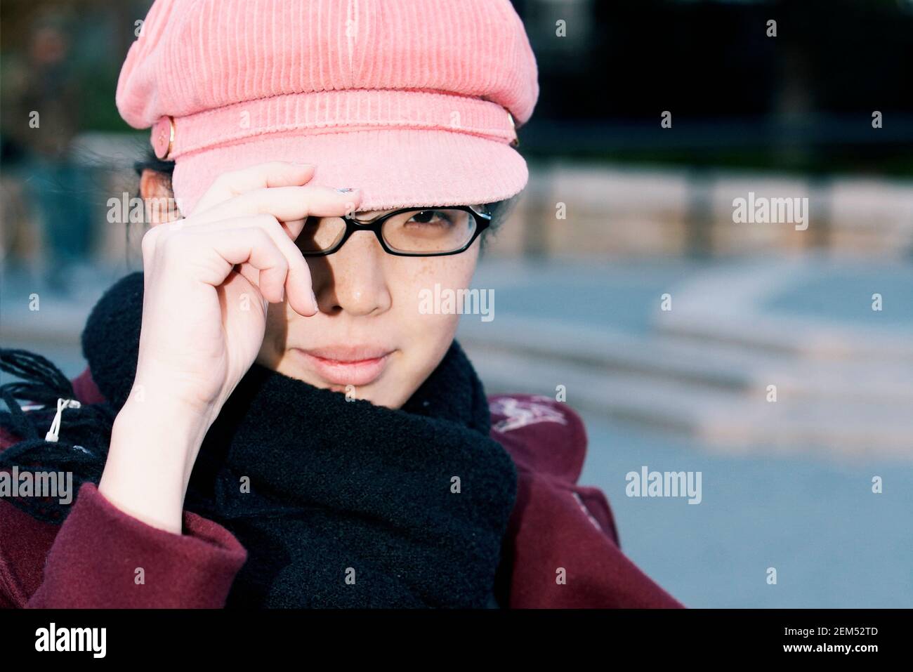 Adjusting cap hi-res stock photography and images - Alamy