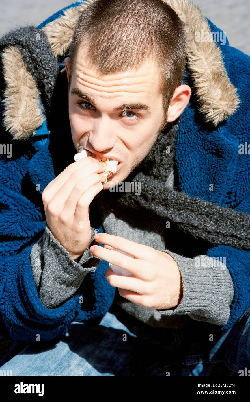 Man eating bread hi-res stock photography and images - Alamy