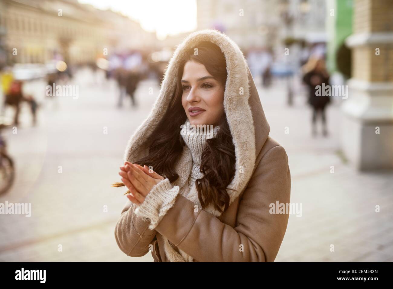 Attractive young woman clapping hands hi-res stock photography and ...