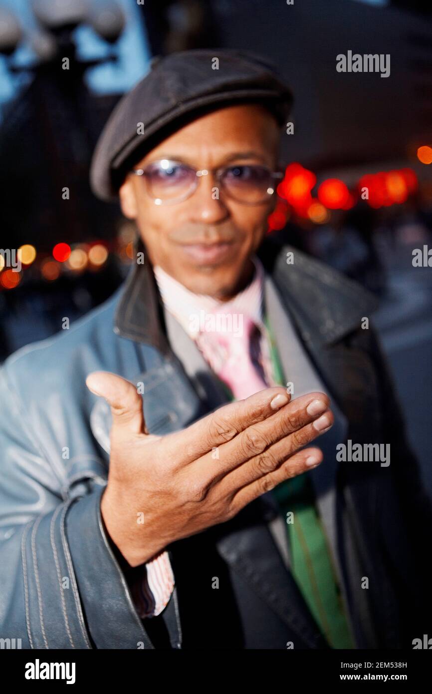 Mid adult man gesturing hi-res stock photography and images - Alamy