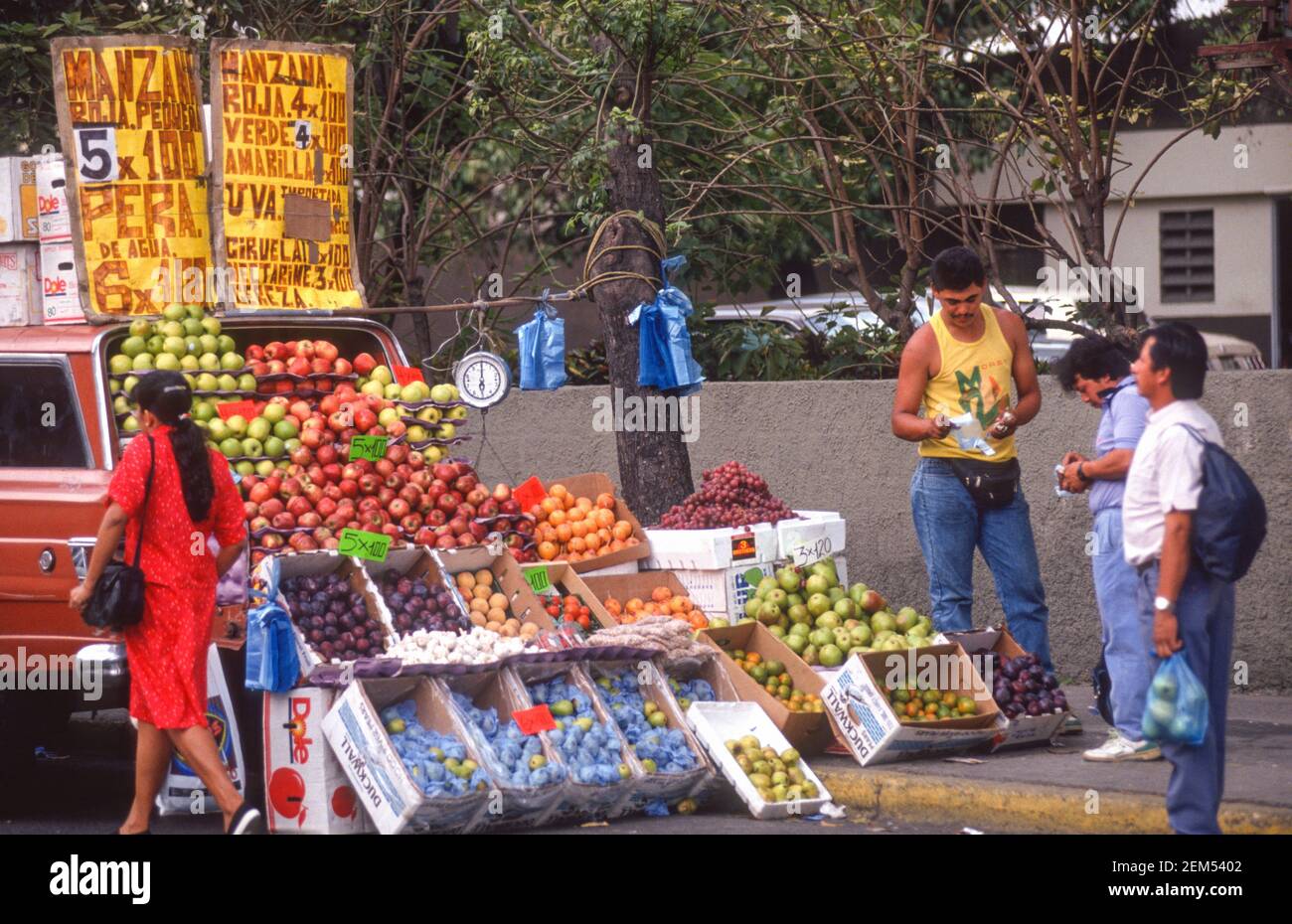 CARACAS, VENEZUELA, 1992 - Fruit vendor sells from his truck Stock ...