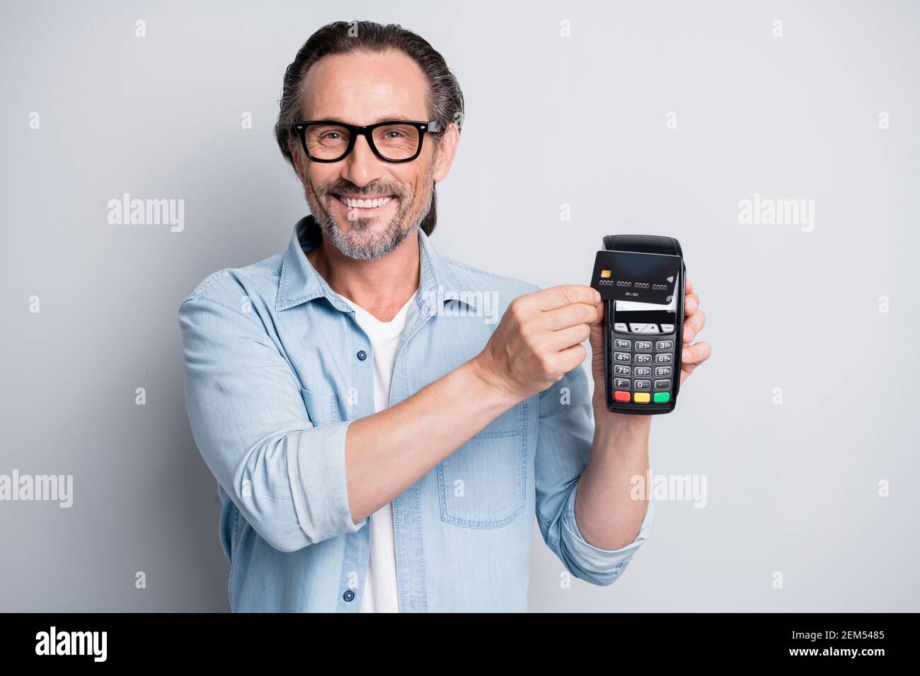 Photo of handsome man happy smile pay paypass terminal shopper buy ...