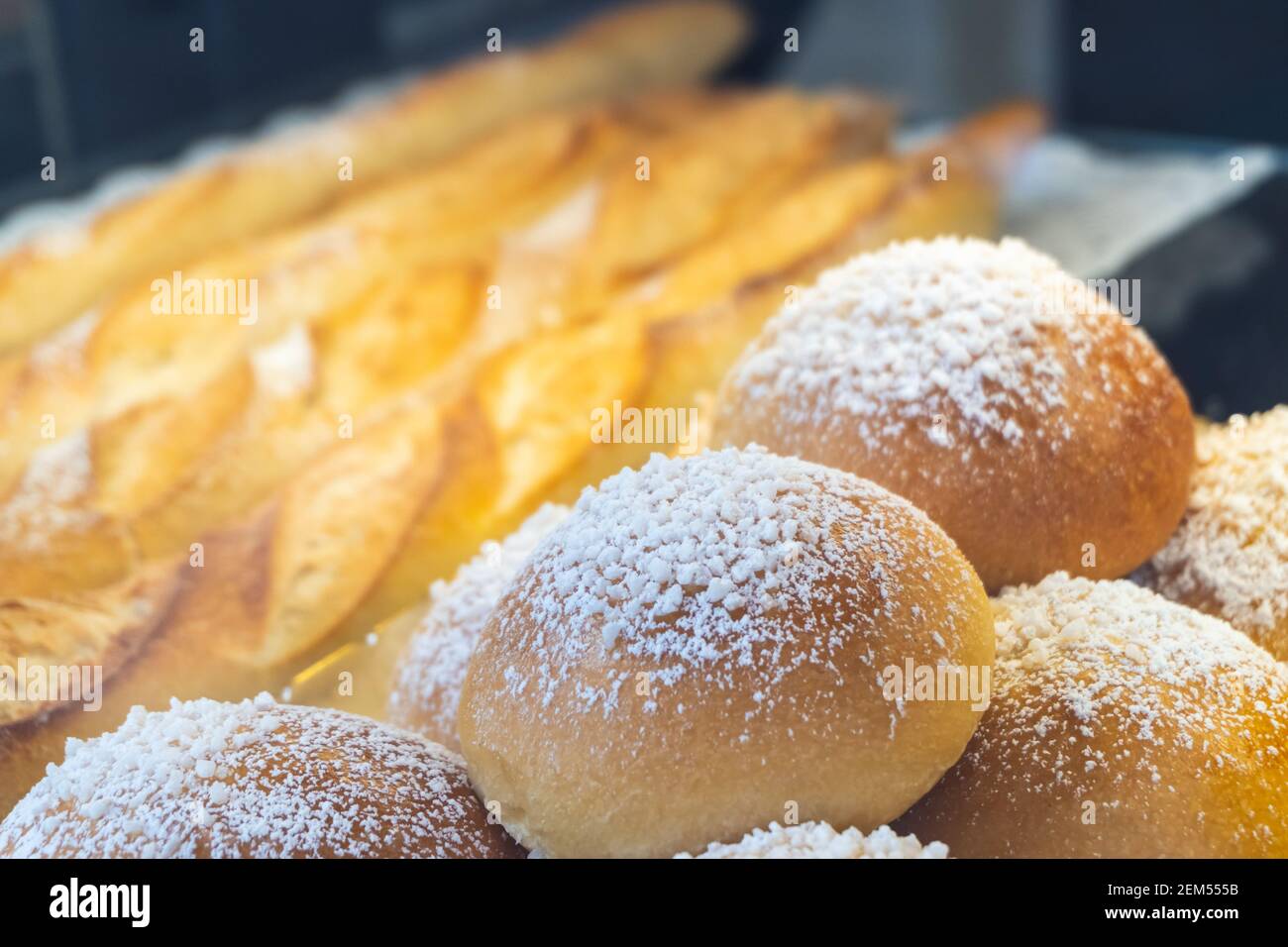 Close-up of sugar coated fluffy buns in bakery Stock Photo - Alamy