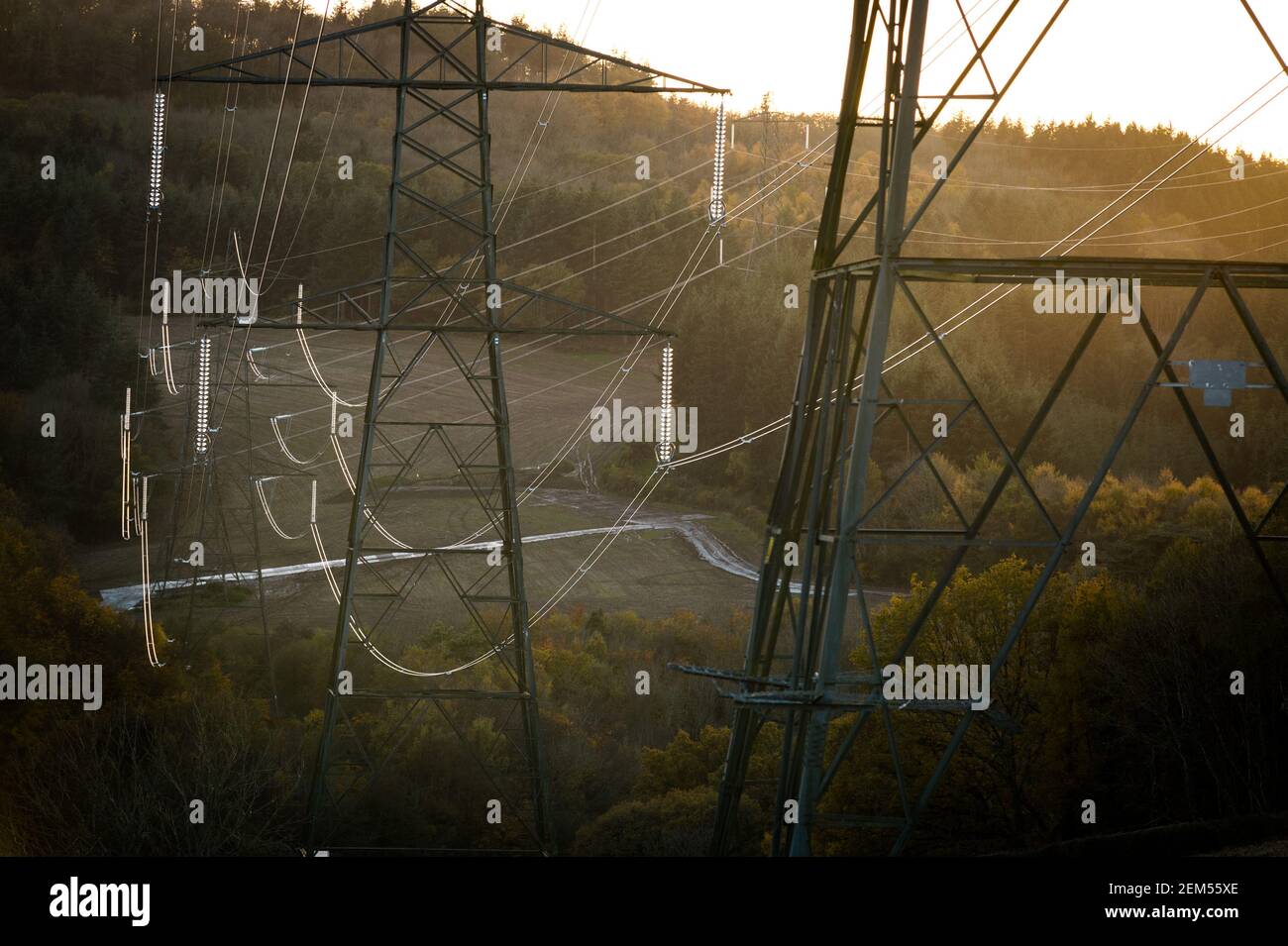 Electricity pylons and power lines across farmland near Exeter, Devon ...