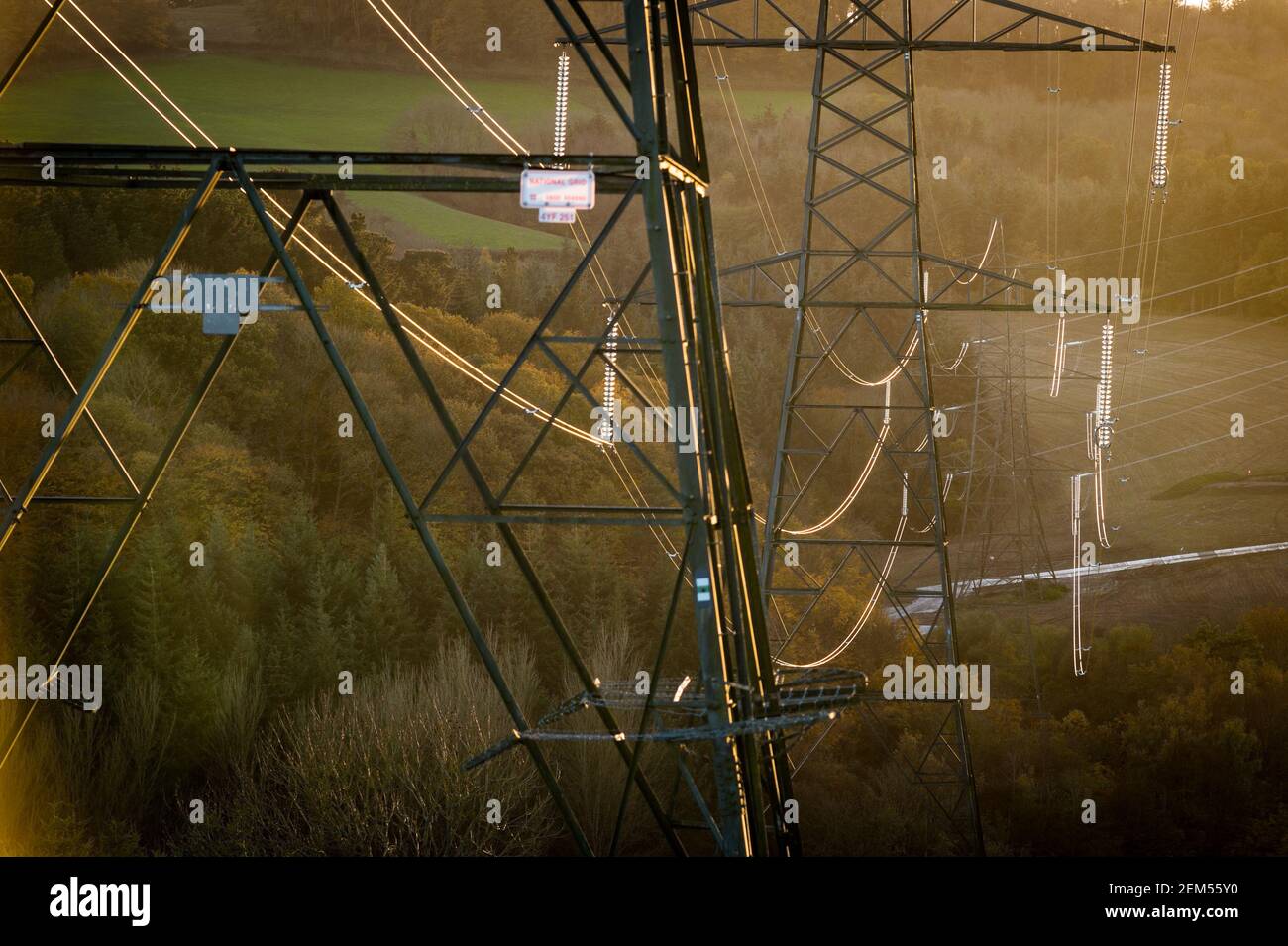 Electricity pylons and power lines across farmland near Exeter, Devon ...