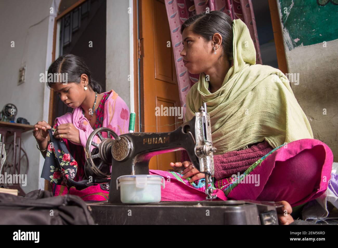 Indian woman sewing machine hi-res stock photography and images - Alamy