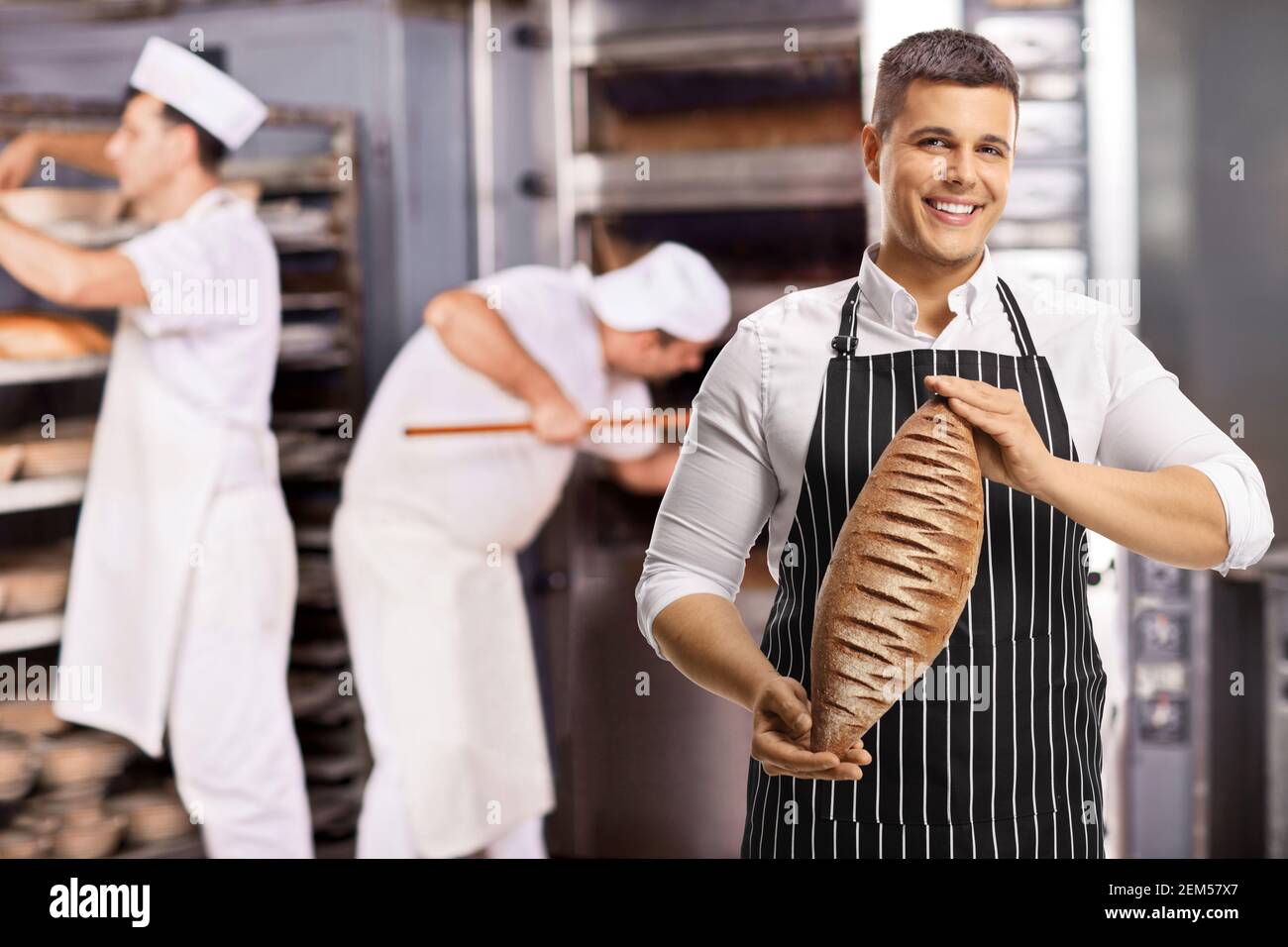 Handsome baker in uniform hi-res stock photography and images - Alamy