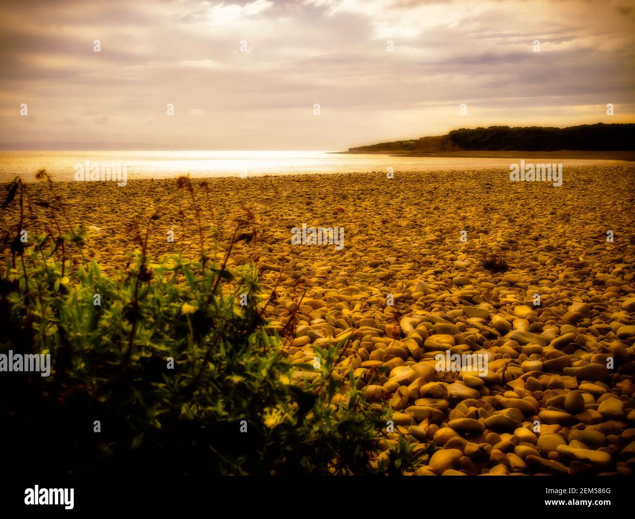 Golden sunset at Cold Knap beach near Barry Island in South Wales Stock ...