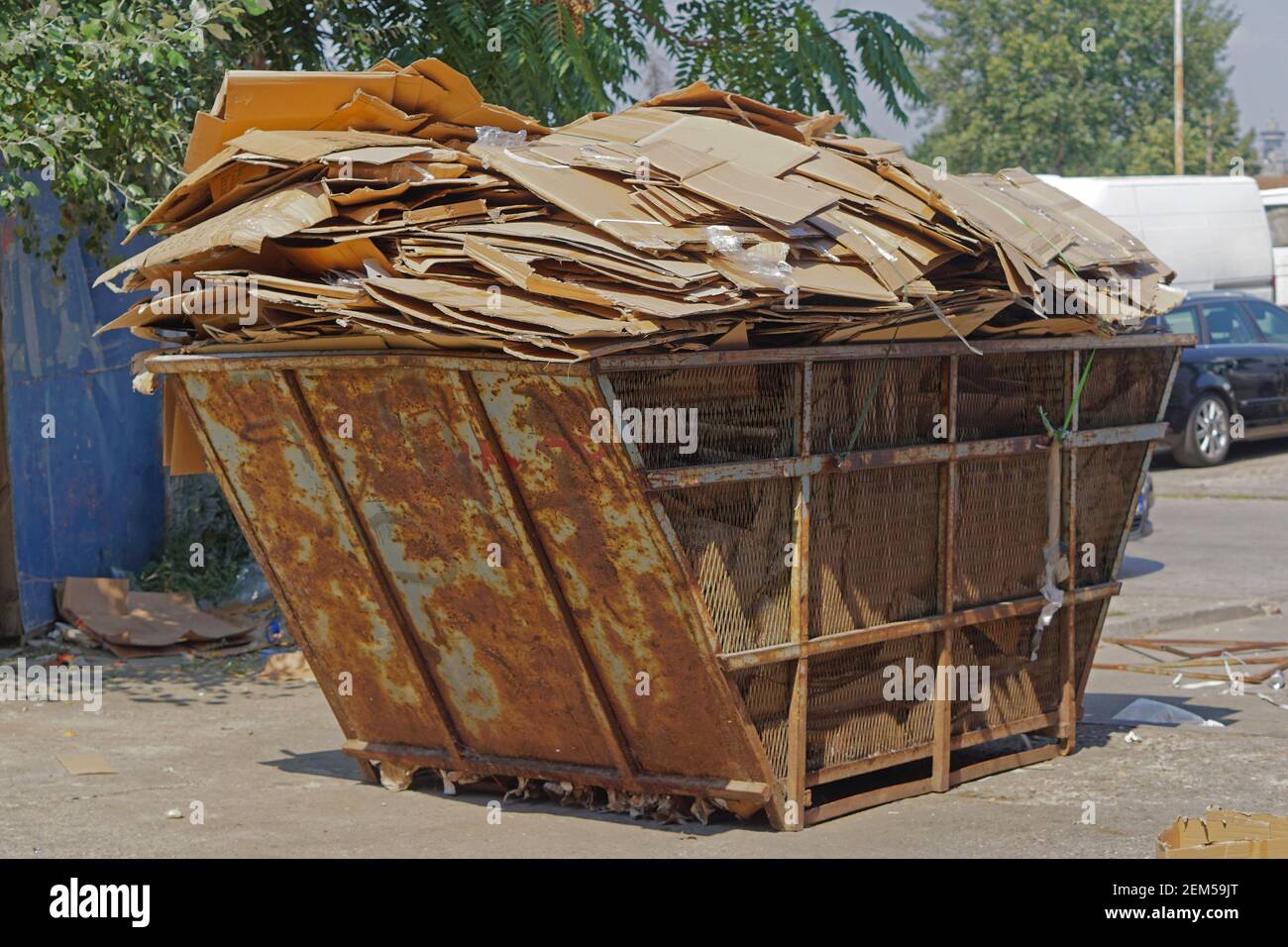 Cardboard carton paper for recycling material in skip Stock Photo - Alamy