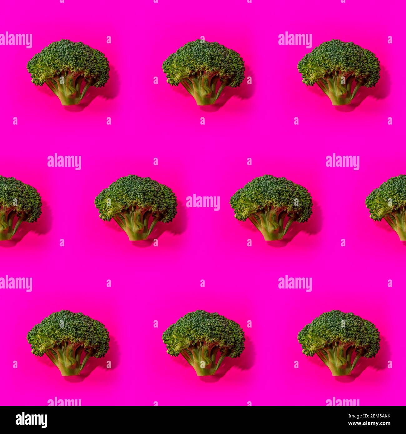 Broccoli pattern on pink background for health and nutrition concept ...