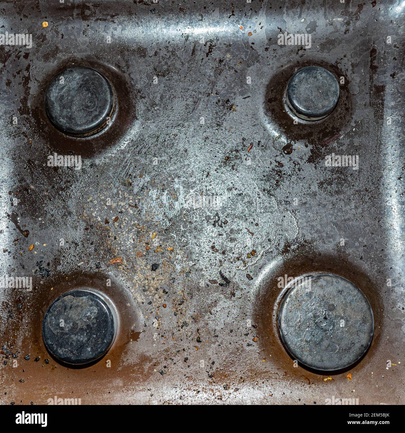 Very greasy dirty surface of brown kitchen gas stove Stock Photo - Alamy
