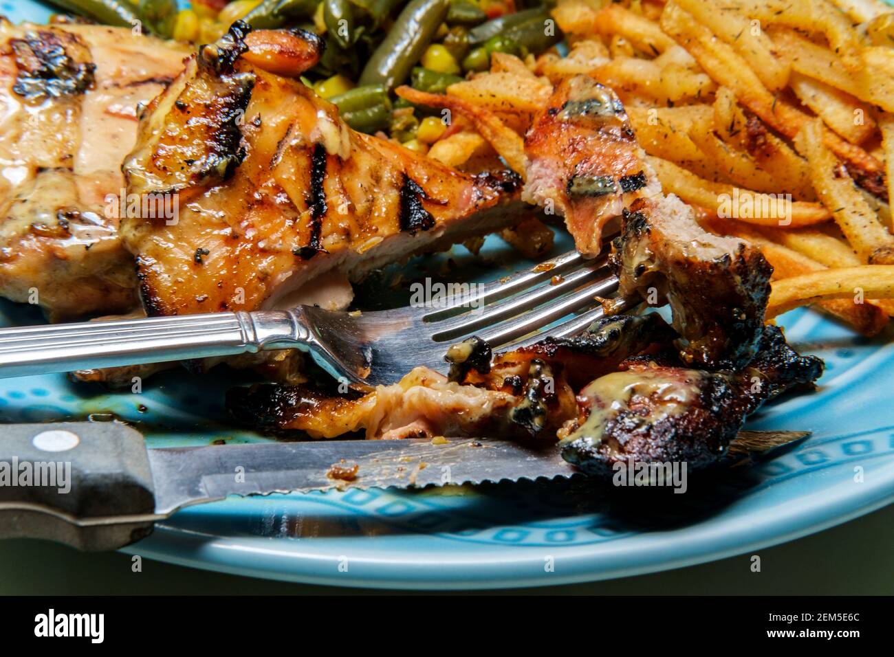 Honey mustard grilled chicken thigh dinner served with home-made ...