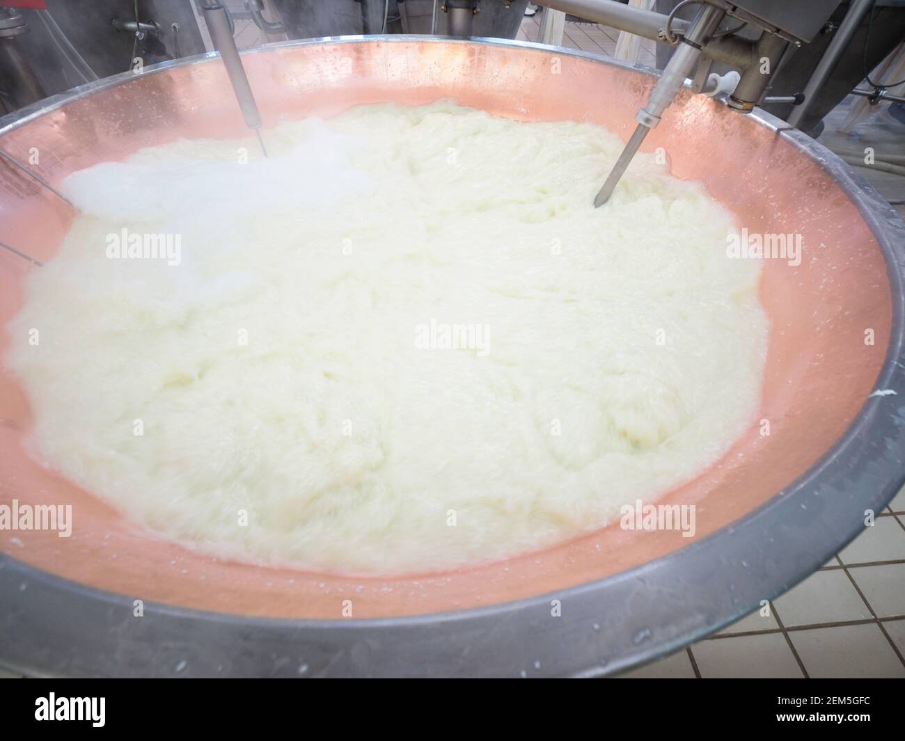 cooking and making cheese in factory Stock Photo - Alamy