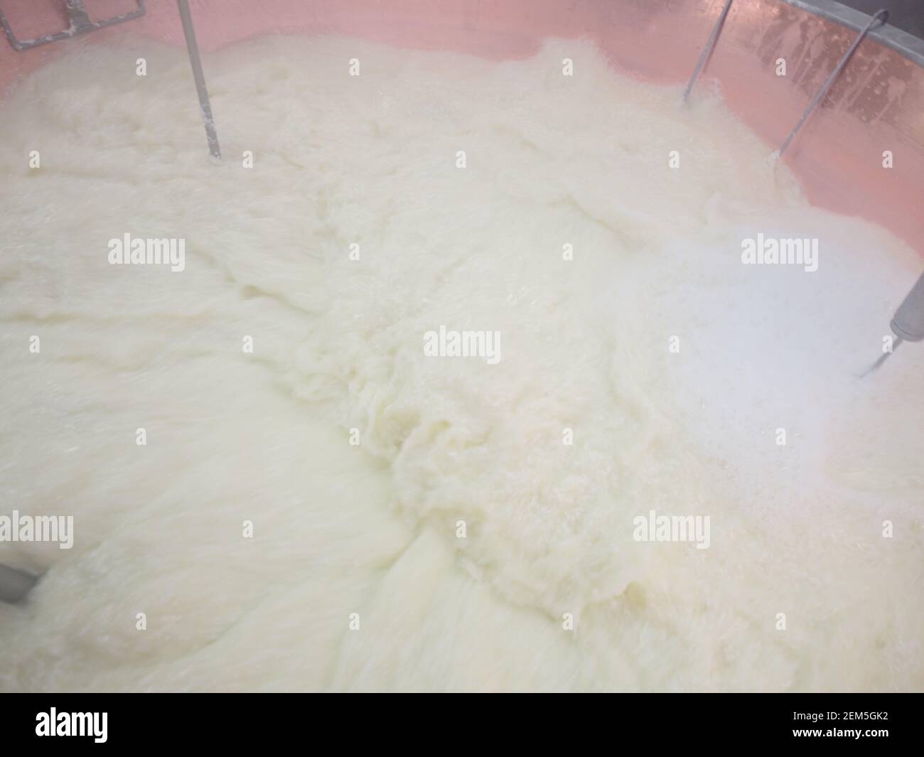 cooking and making cheese in factory Stock Photo - Alamy