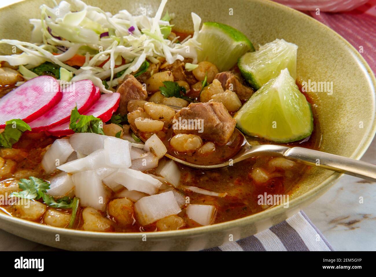 Mexican Pozole rojo pork and hominy stew with variety of fresh ...