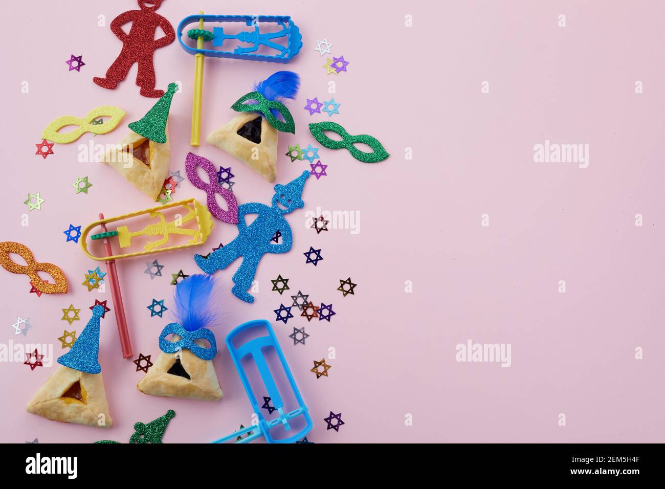 Purim celebration concept. Jewish carnival background. Top view. Flat ...