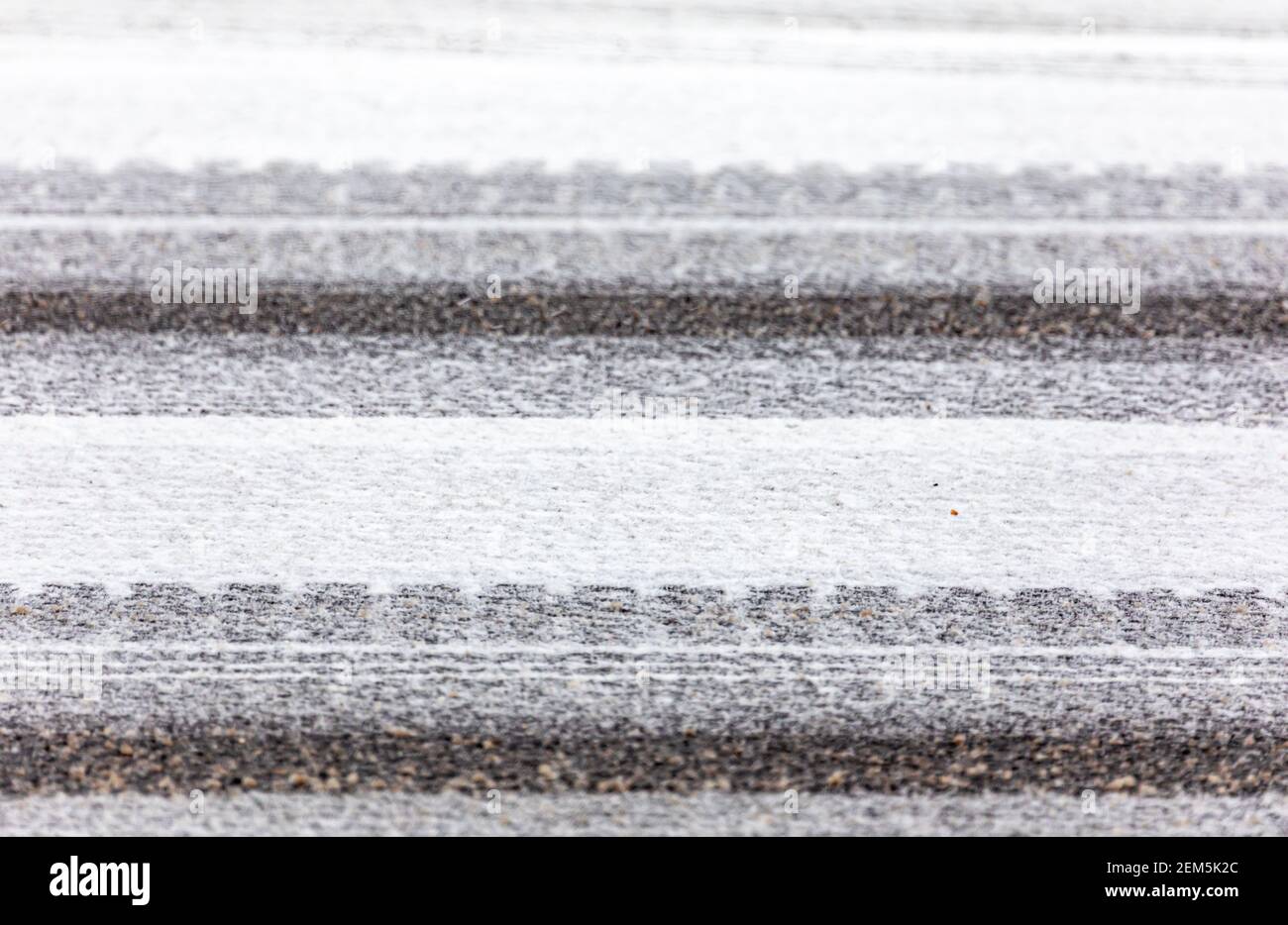 Snow falling on background street hi-res stock photography and images ...