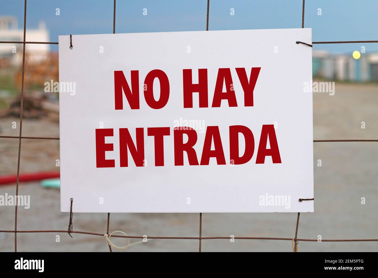 Entrance is prohibited sign in Spanish. Entrance to the construction ...