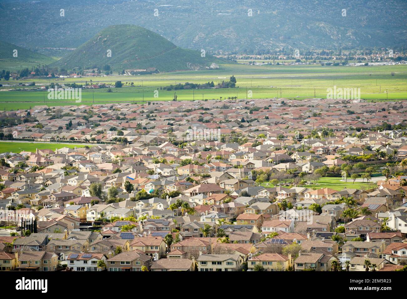 Aerial view suburban neighborhood with identical wealthy villas next to ...