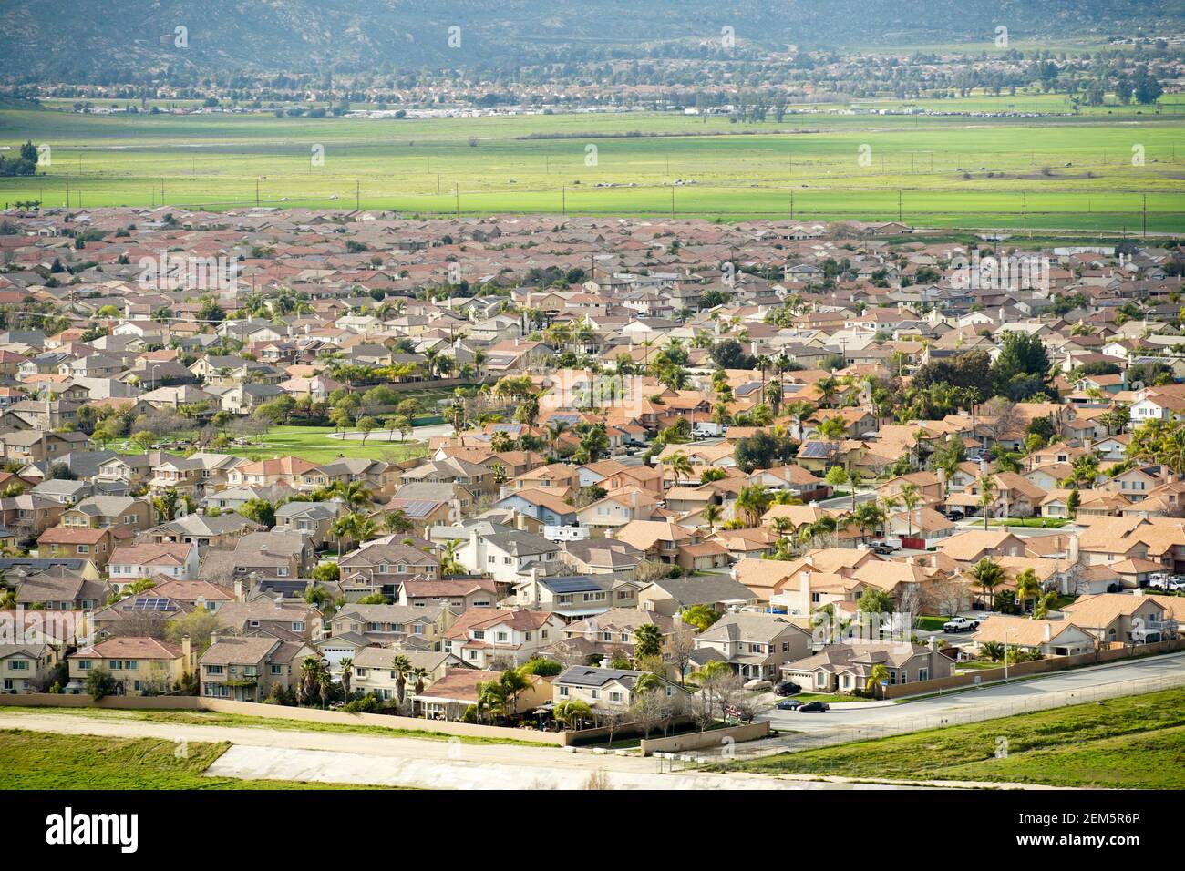 Aerial view suburban neighborhood with identical wealthy villas next to ...