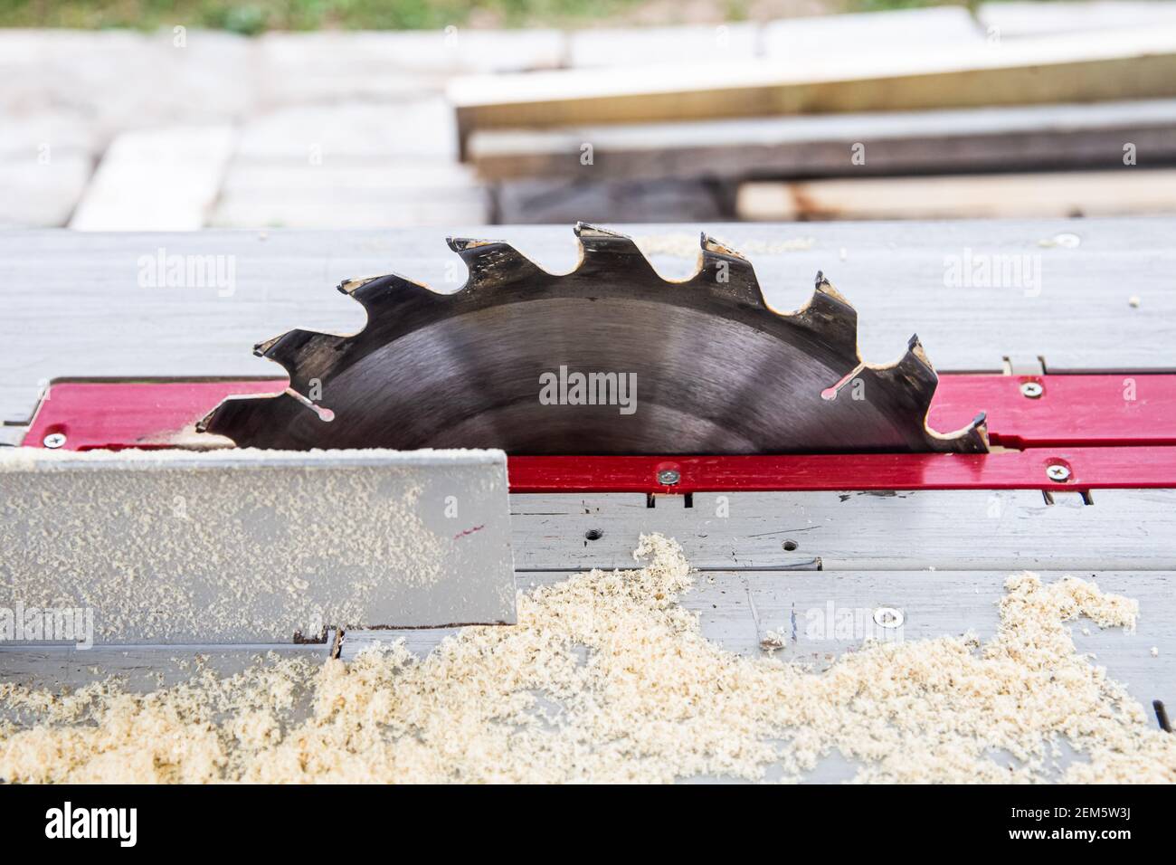 Saws details of furniture with a circular saw. Close up. circular saw ...